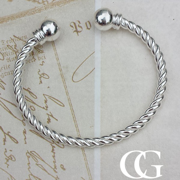 Ladies Silver Torque bangle with a Twist | Chains of Gold