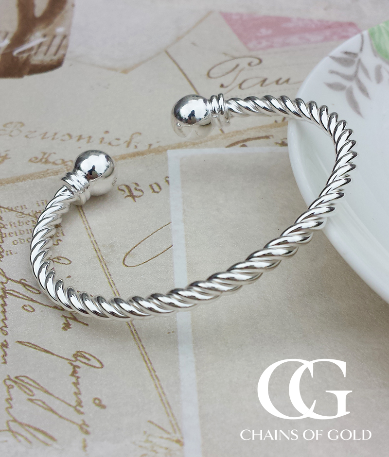 Ladies Silver Torque bangle with a Twist | Chains of Gold
